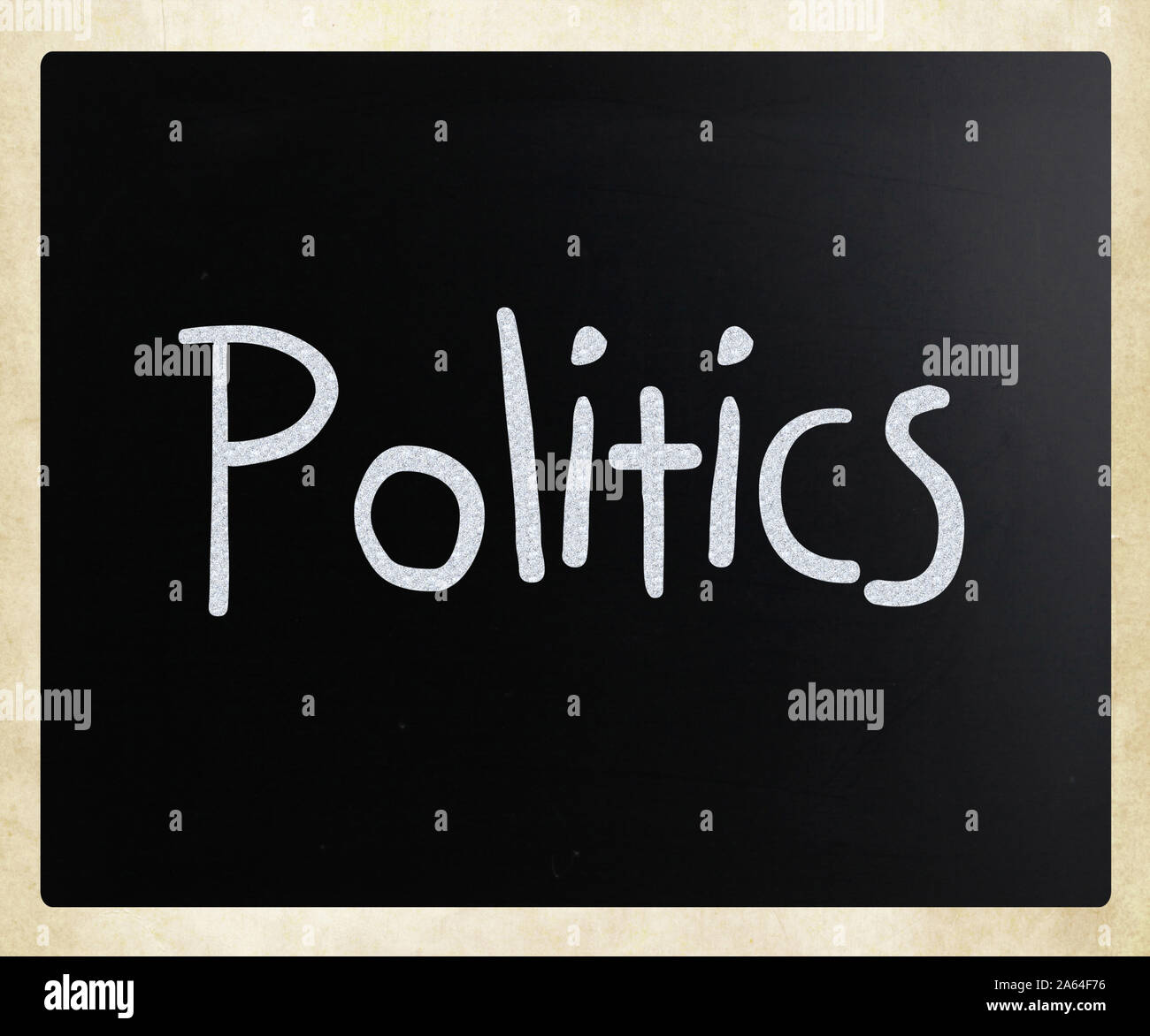 The word "Politics" handwritten with white chalk on a blackboard Stock ...