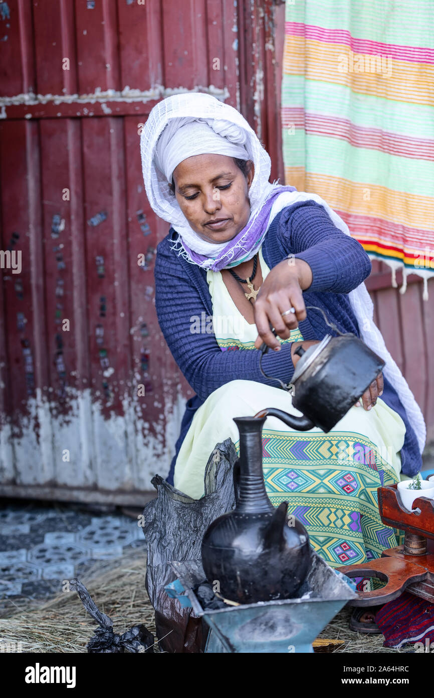 LALIBELA, ETHIOPIA, MAY 1st. 2019, Ethiopian traditional Coffee ceremony, local women preparing ...