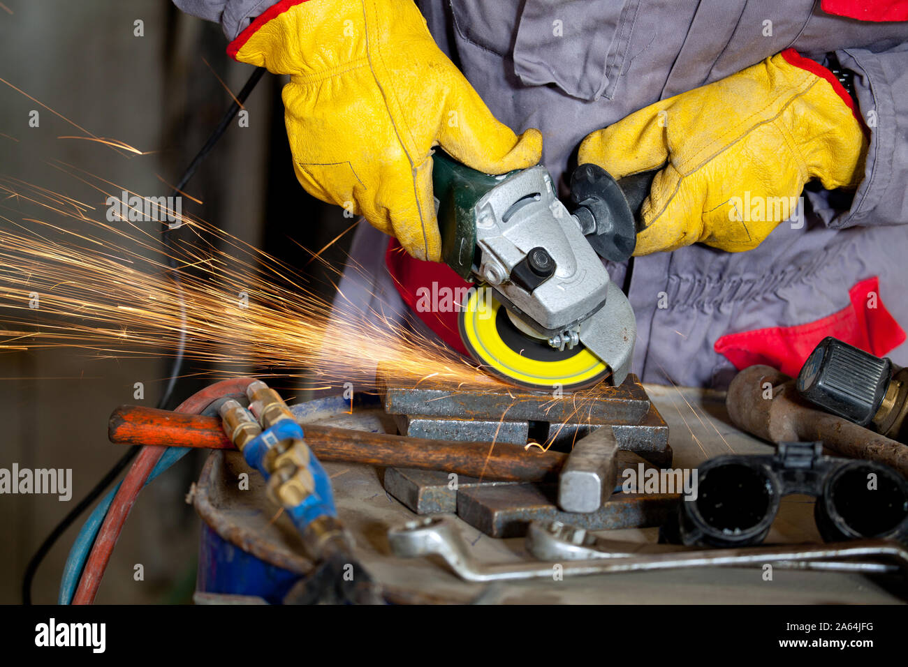 worker with grinder - details Stock Photo - Alamy
