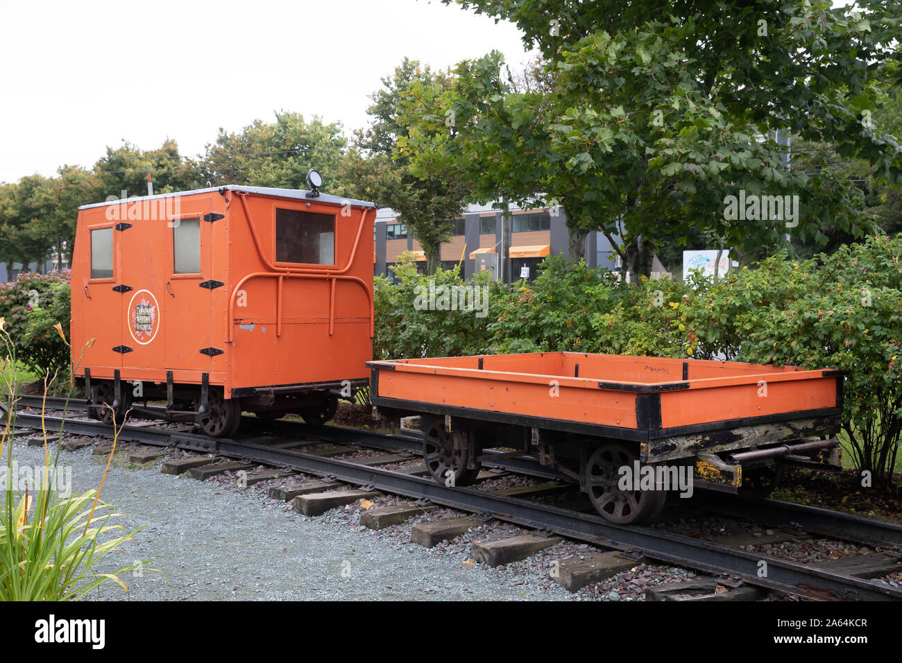 Orange train carriage in Canada Stock Photo - Alamy
