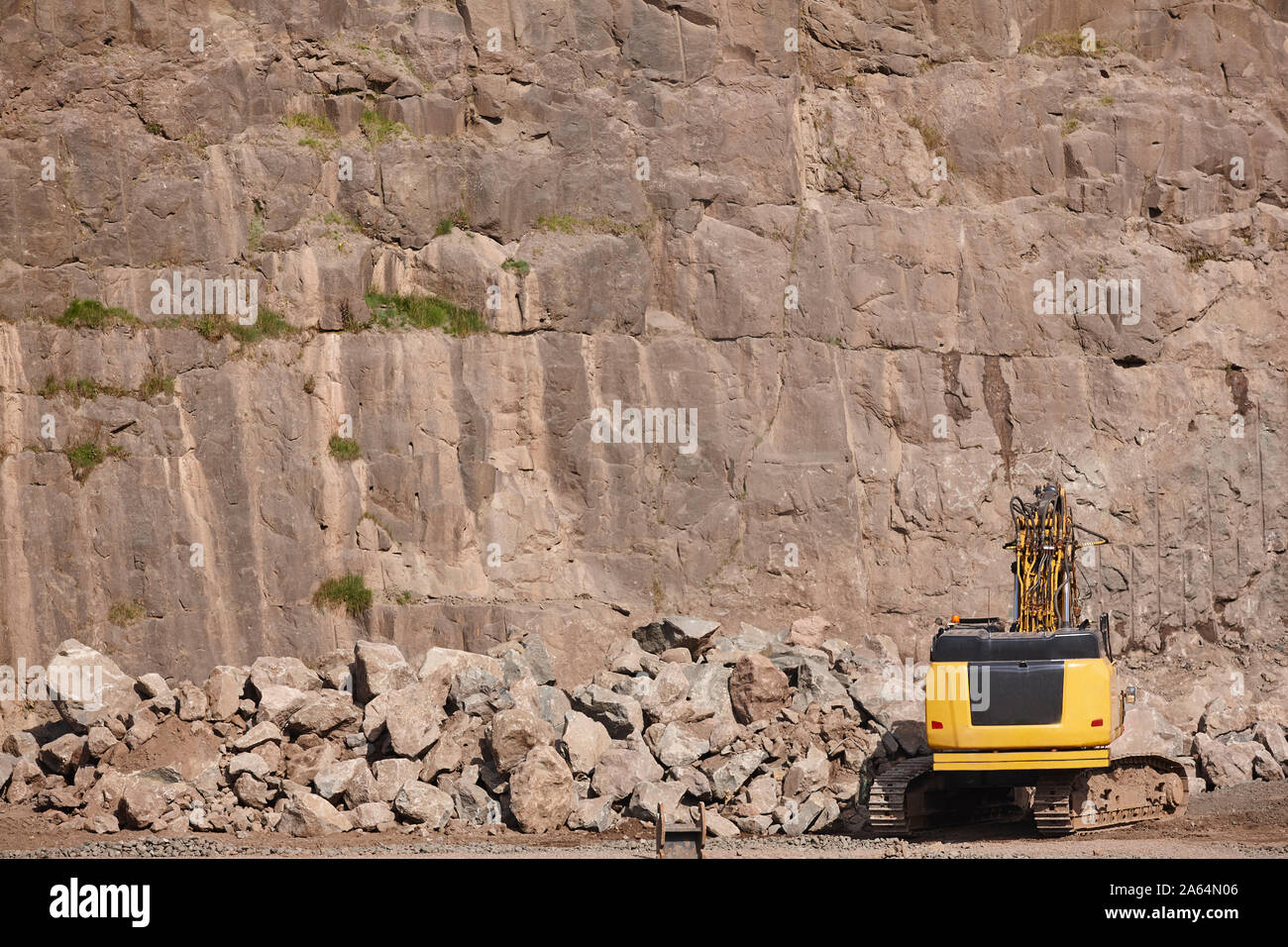 Excavator working on a stone quarry. Geological and mineral excavation ...