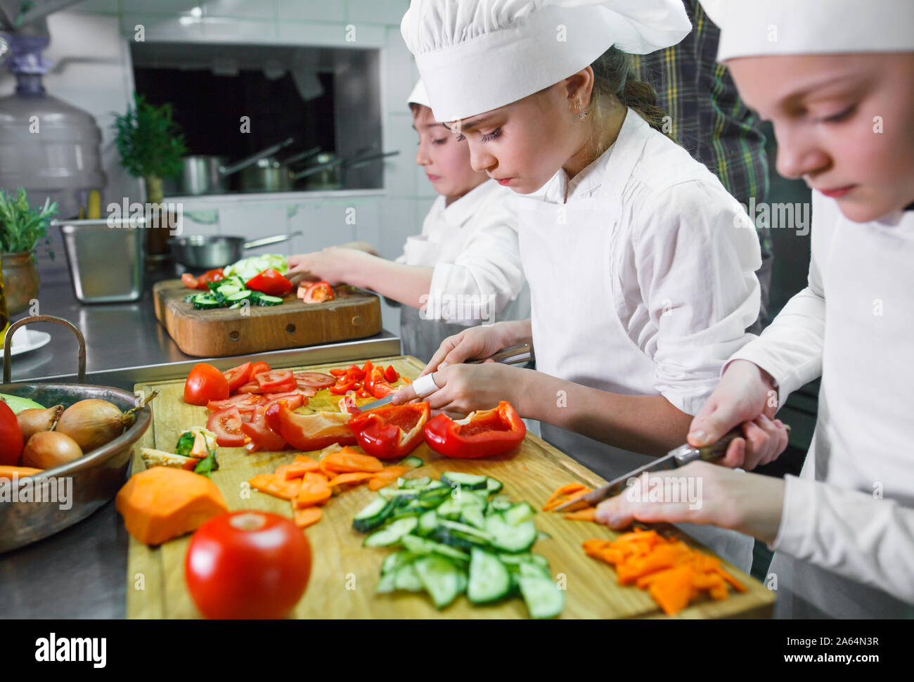 children cooking lunch in a restaurant kitchen Stock Photo - Alamy