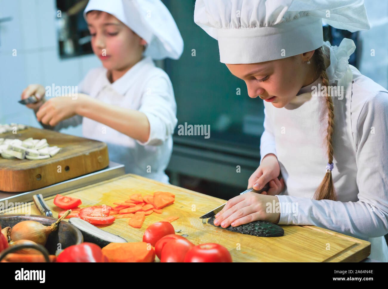children cooking lunch in a restaurant kitchen Stock Photo - Alamy