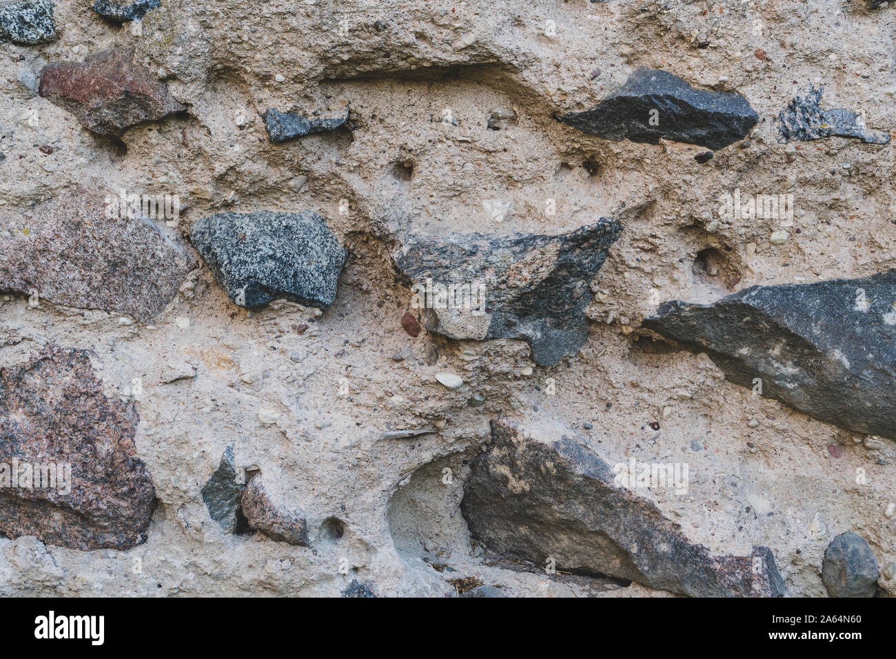Damaged stone wall of the old historic building Stock Photo - Alamy