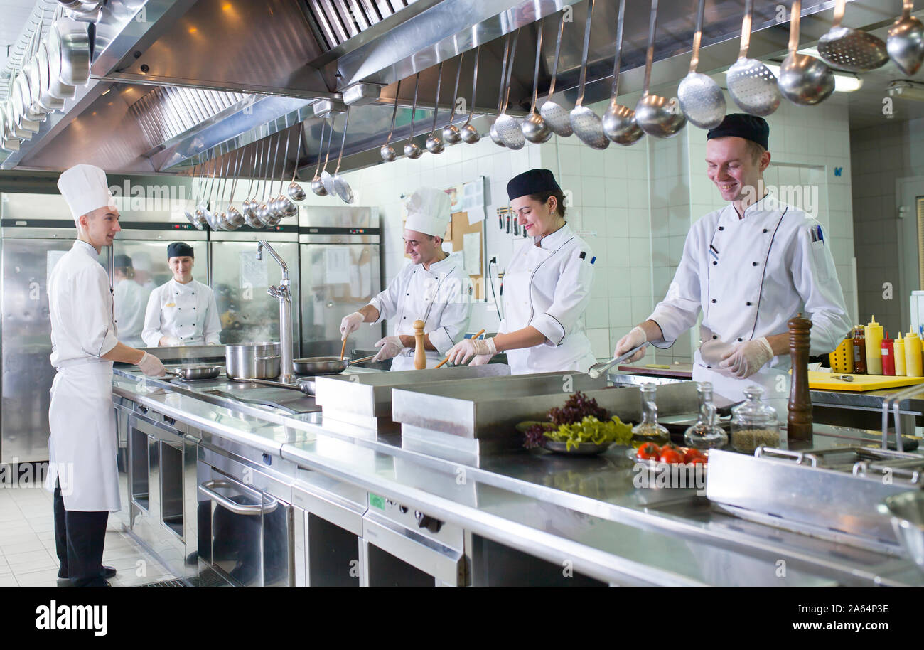 the work of the cook in the kitchen of the restaurant Stock Photo - Alamy