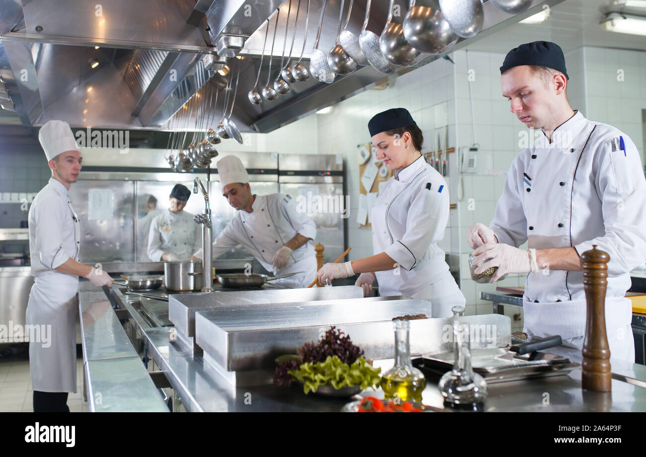 the work of the cook in the kitchen of the restaurant Stock Photo - Alamy