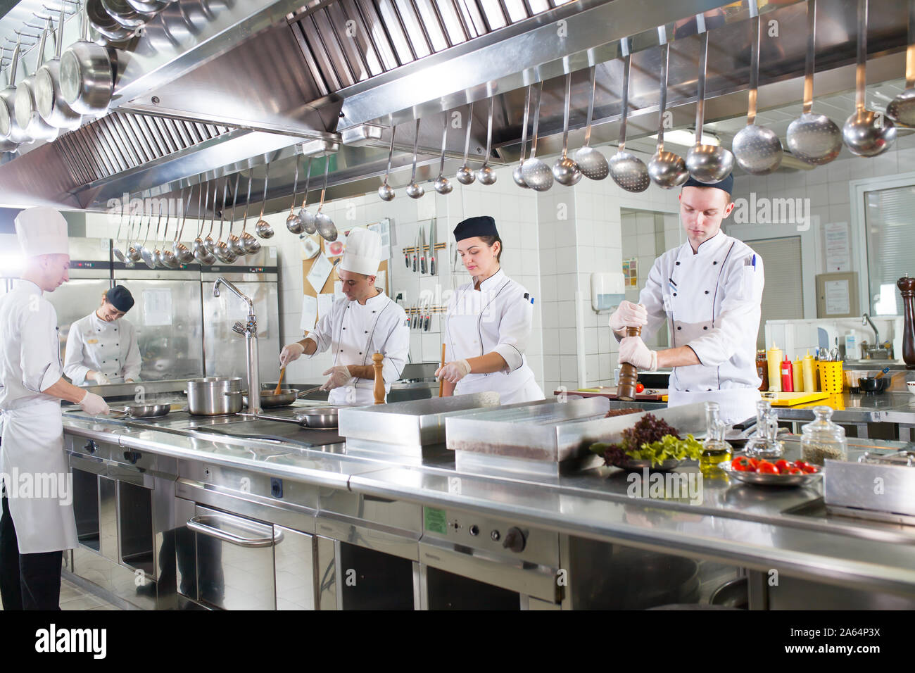 the work of the cook in the kitchen of the restaurant Stock Photo - Alamy