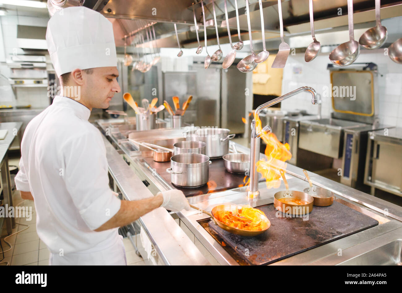 cook cooks in a restaurant Stock Photo - Alamy