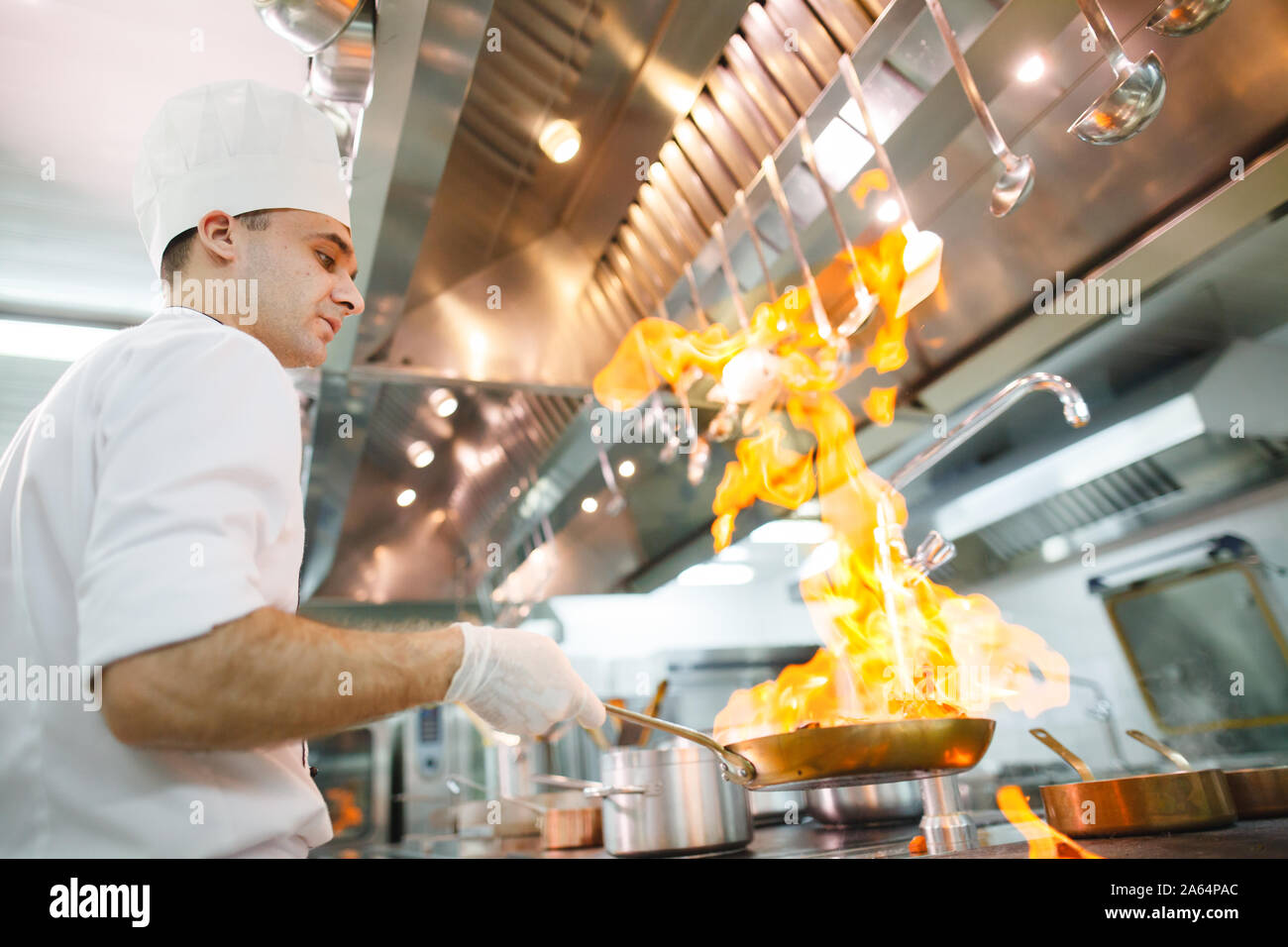 cook cooks in a restaurant Stock Photo - Alamy