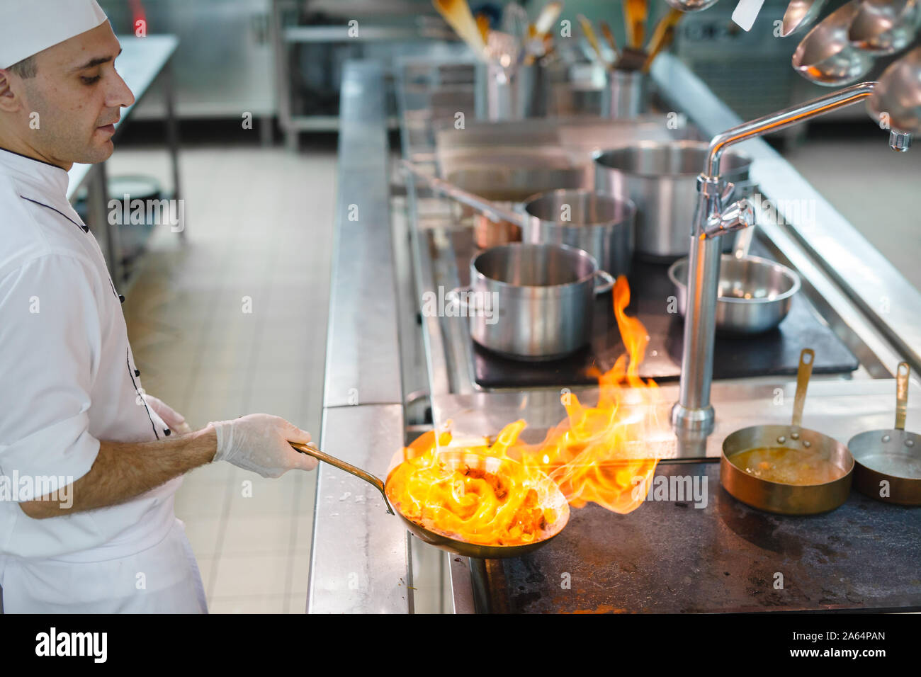 cook cooks in a restaurant Stock Photo - Alamy