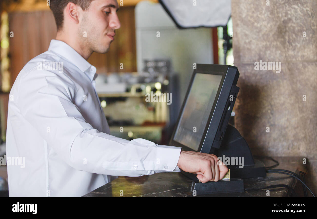 Hand Swiping Credit Card In Store Stock Photo - Alamy