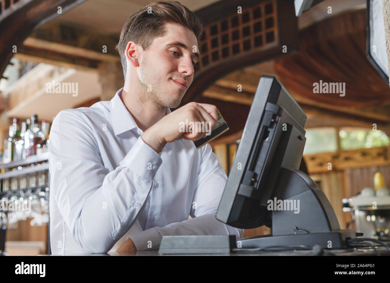 Hand Swiping Credit Card In Store Stock Photo - Alamy