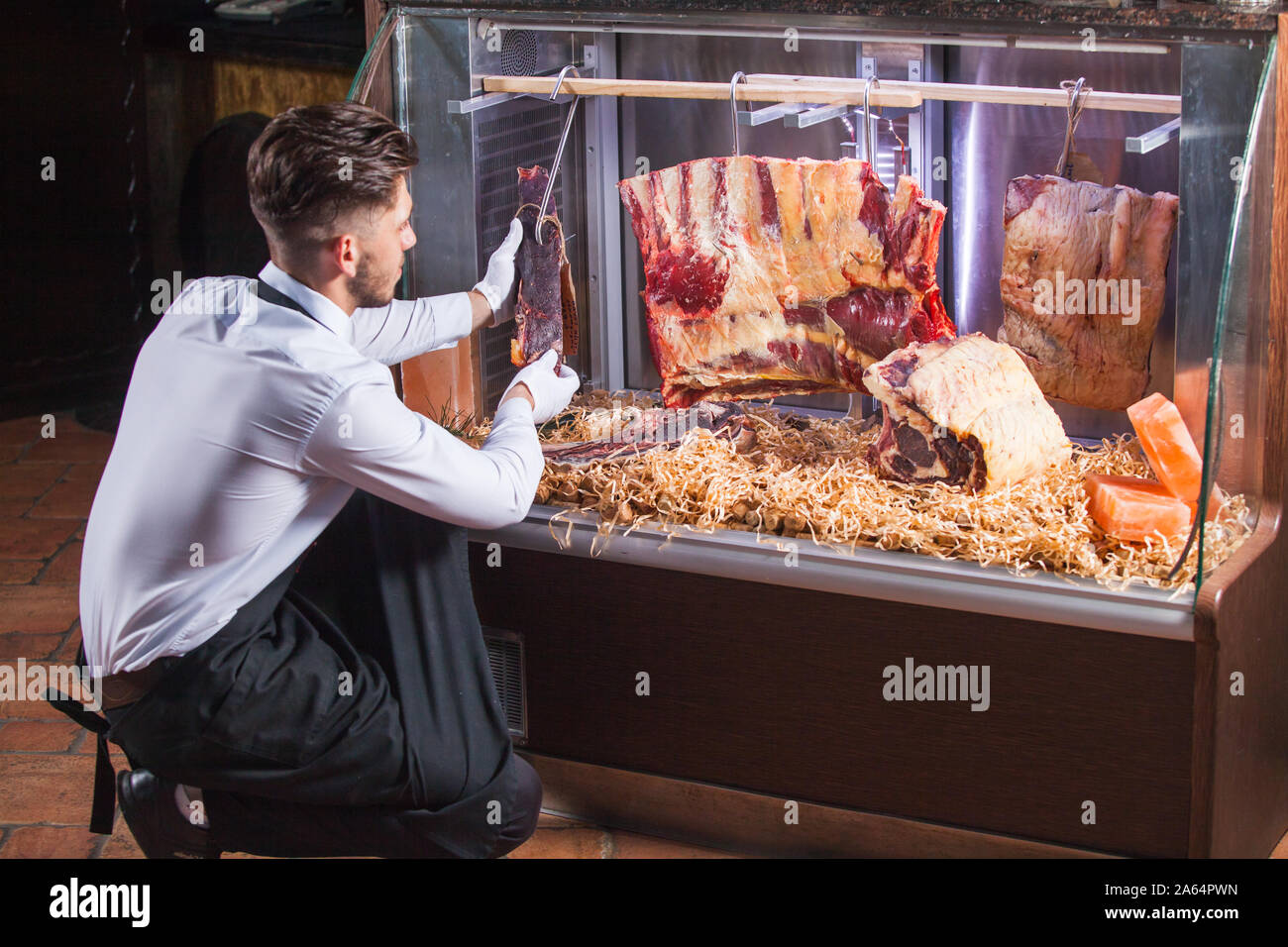 Display of Dry Aged Meat Steaks in butchers shop or restaurant in an ...