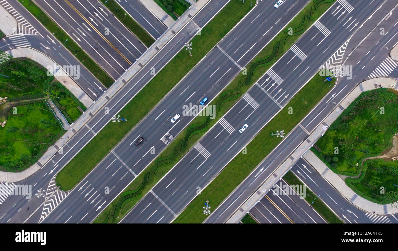 Top down aerial view of the clover like road junction in Chinese city ...