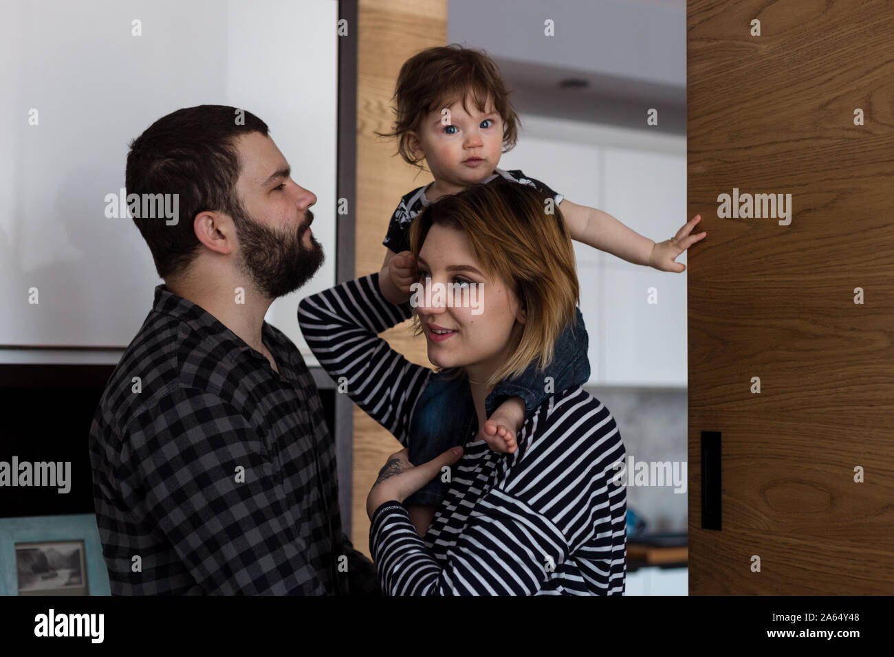 Mother giving son piggyback hi-res stock photography and images - Alamy