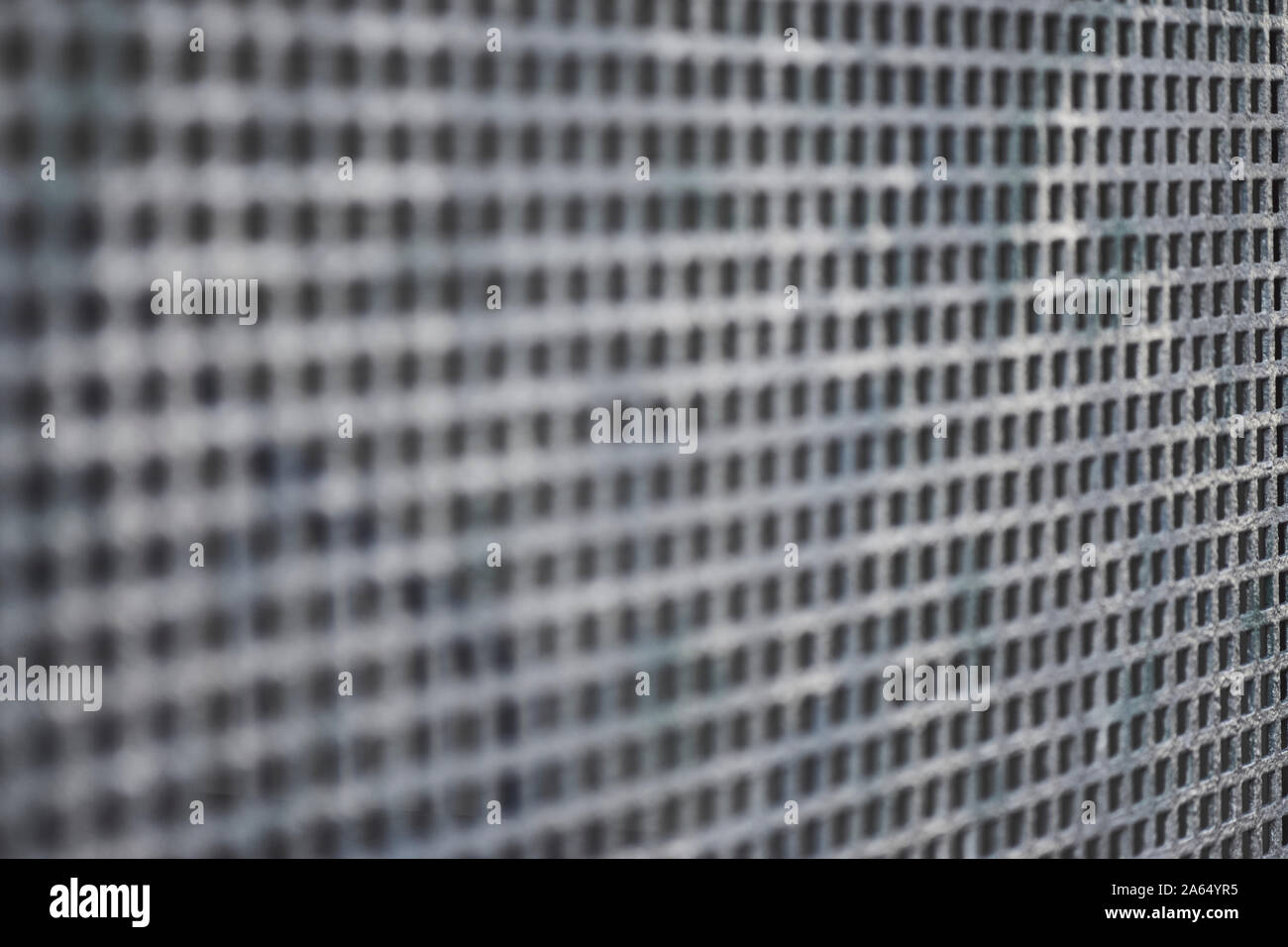 Close up background image of an iron grating, regular with a distinct ...