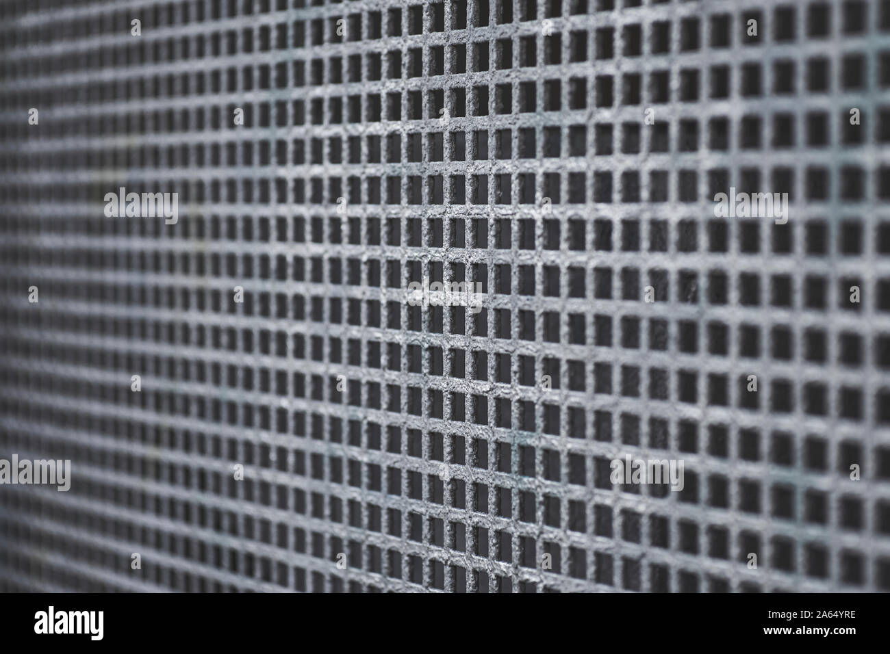 Close up background image of an iron grating, regular with a distinct ...