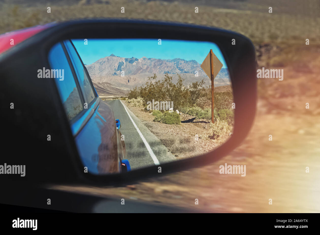 Road reflecting in the sideview mirror of a car Stock Photo - Alamy
