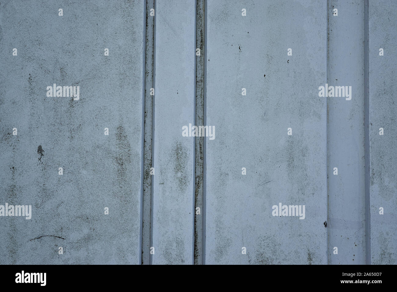 Background image made up of a close up of a modern ribbed concrete wall ...