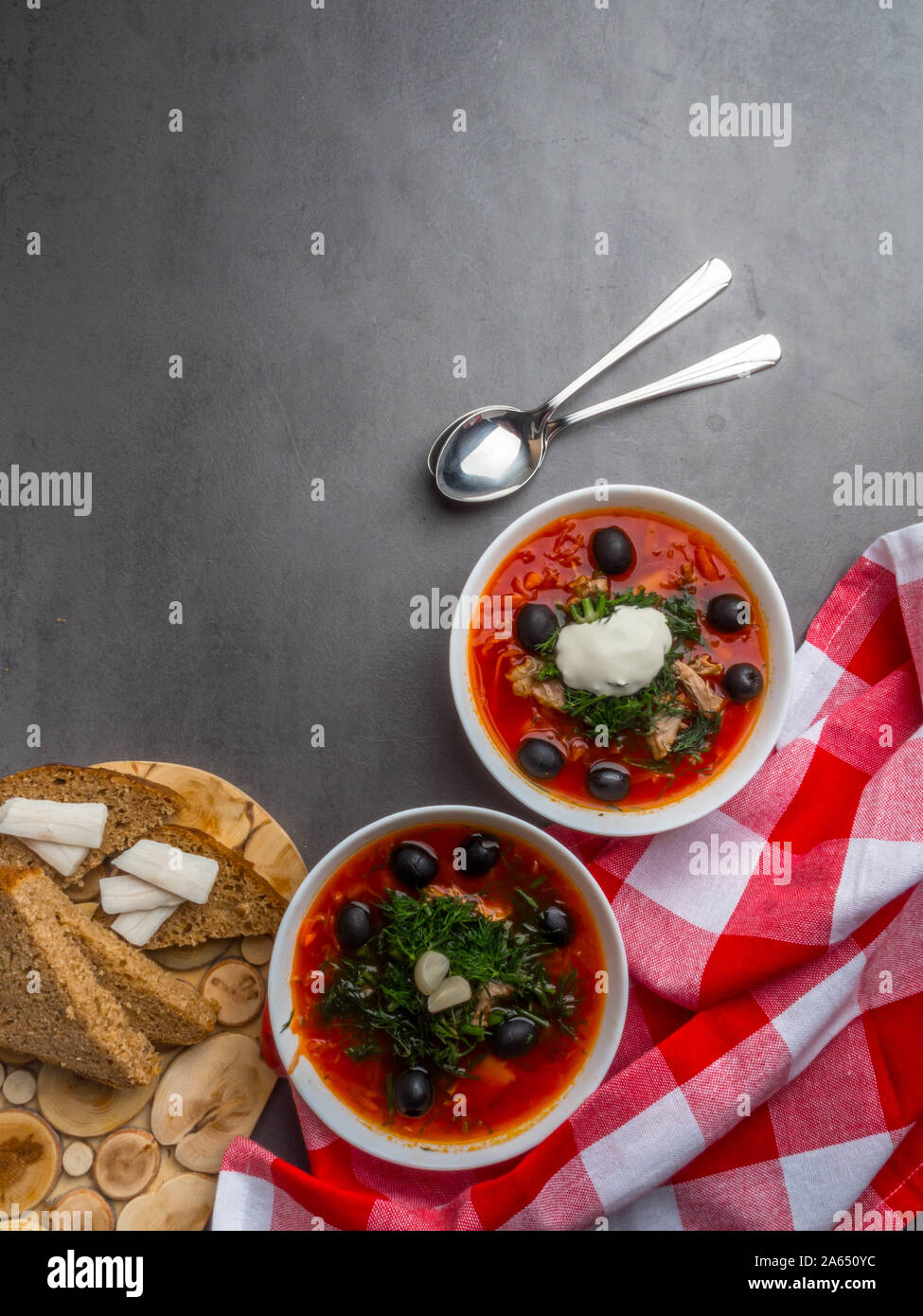Ukrainian and Russian cuisine. Red borsch on a grey background. Red ...