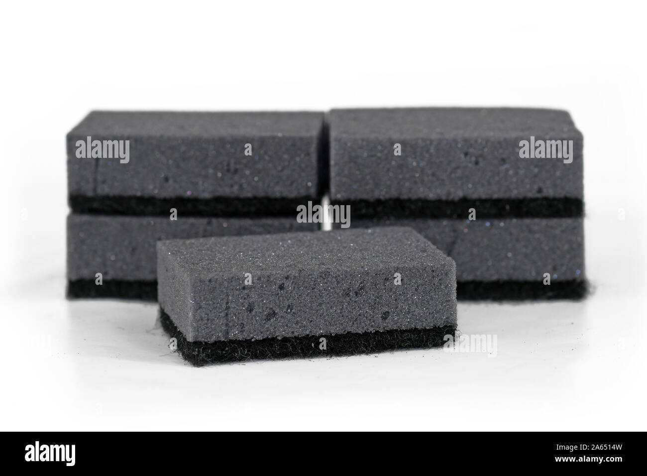 Gray kitchen sponge with for manual dishwashing with more sponges in ...