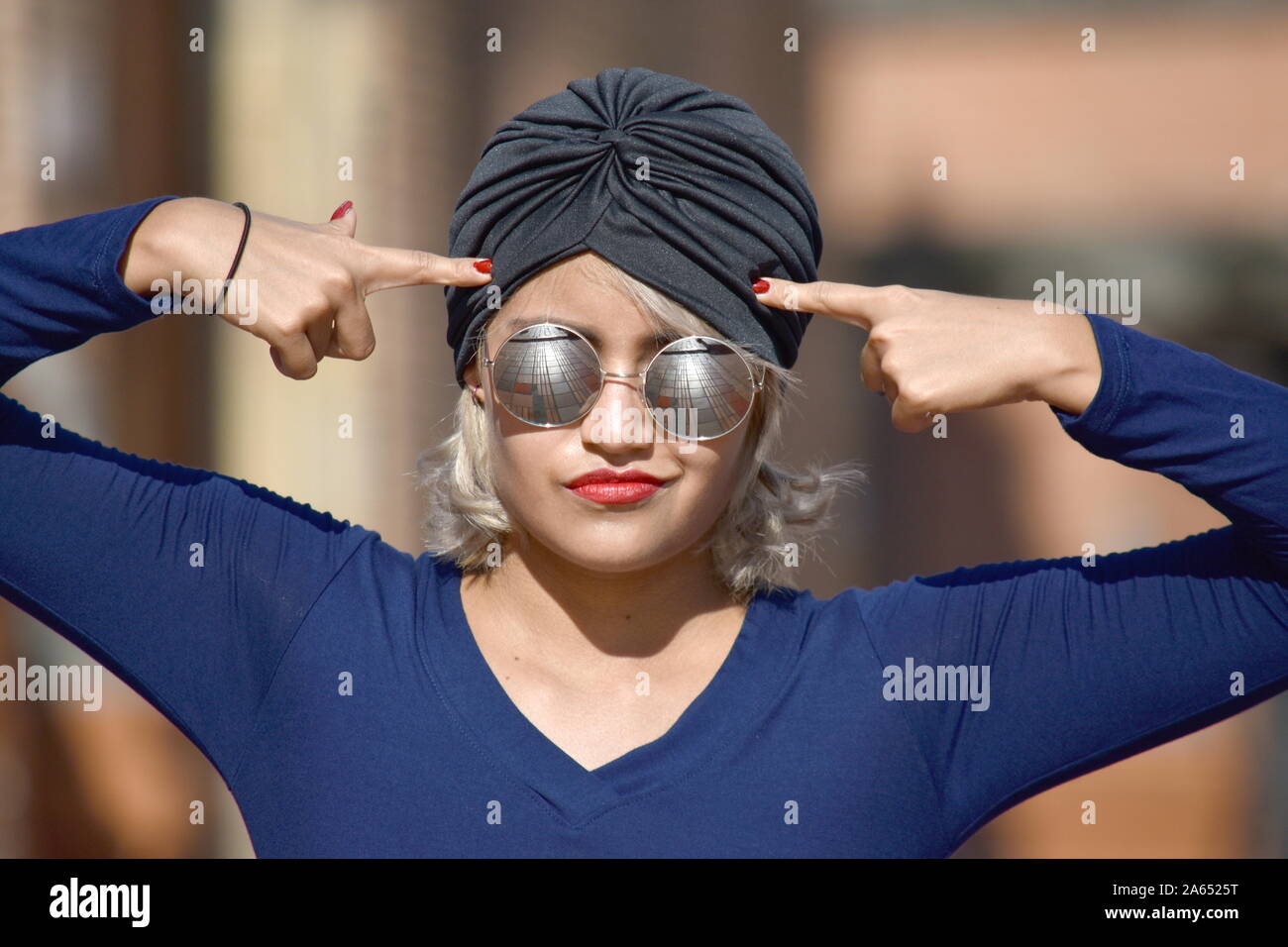 Minority Muslim Female And Confusion Wearing Turban Stock Photo - Alamy