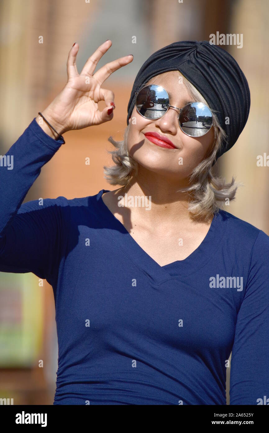An Islamic Woman And Okay Sign Stock Photo - Alamy
