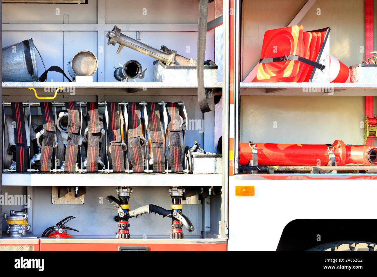 Fire hoses, valves, cranes, road cones, hydrants and a galvanized metal ...