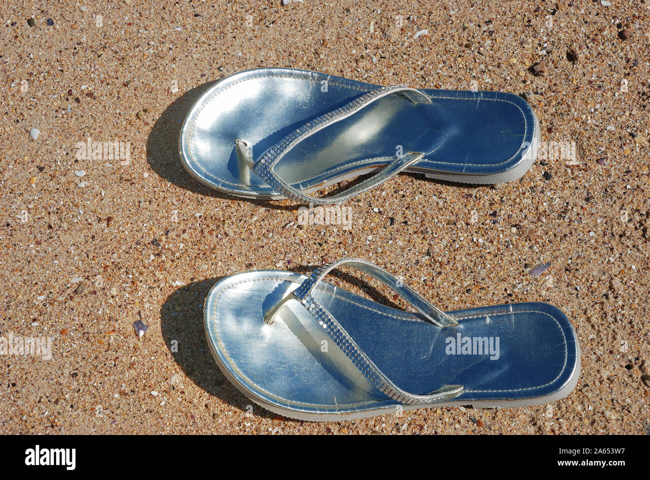 Silver flip flops hi-res stock photography and images - Alamy