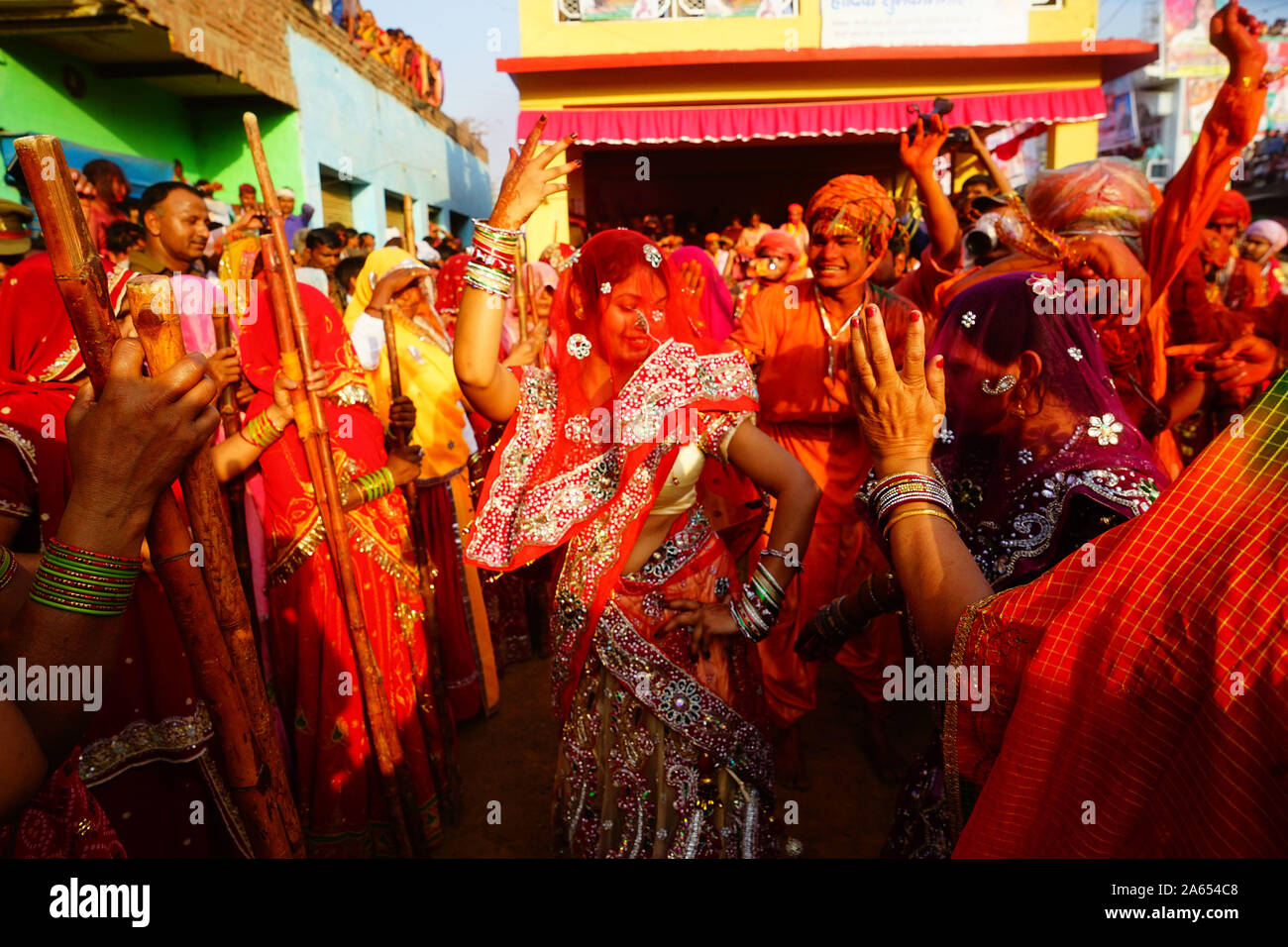 Women dancing, Lathmar Holi festival, Mathura, Uttar Pradesh, India ...