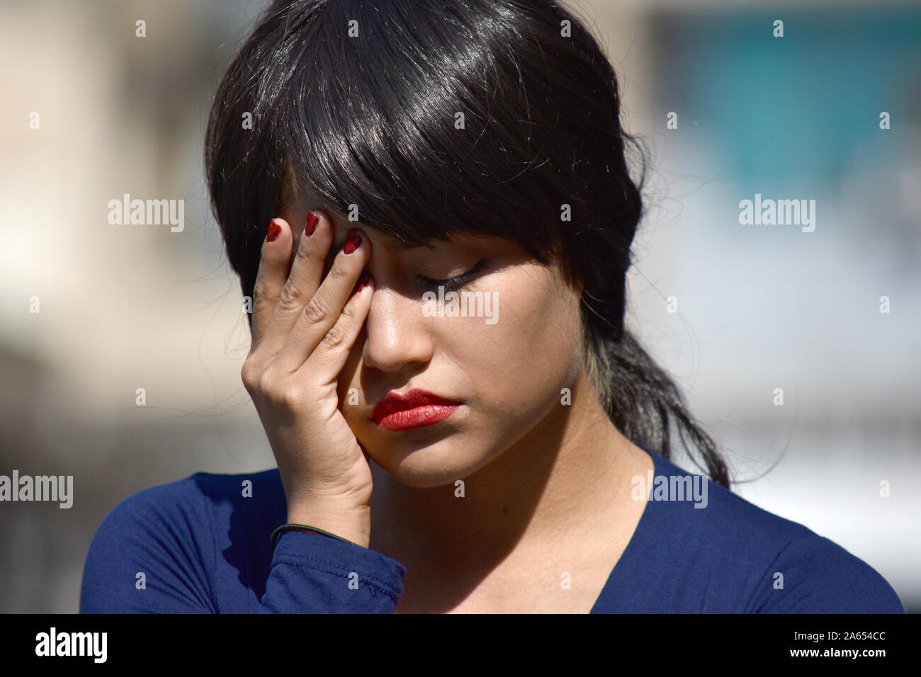 Sad Hispanic Female Woman Stock Photo - Alamy