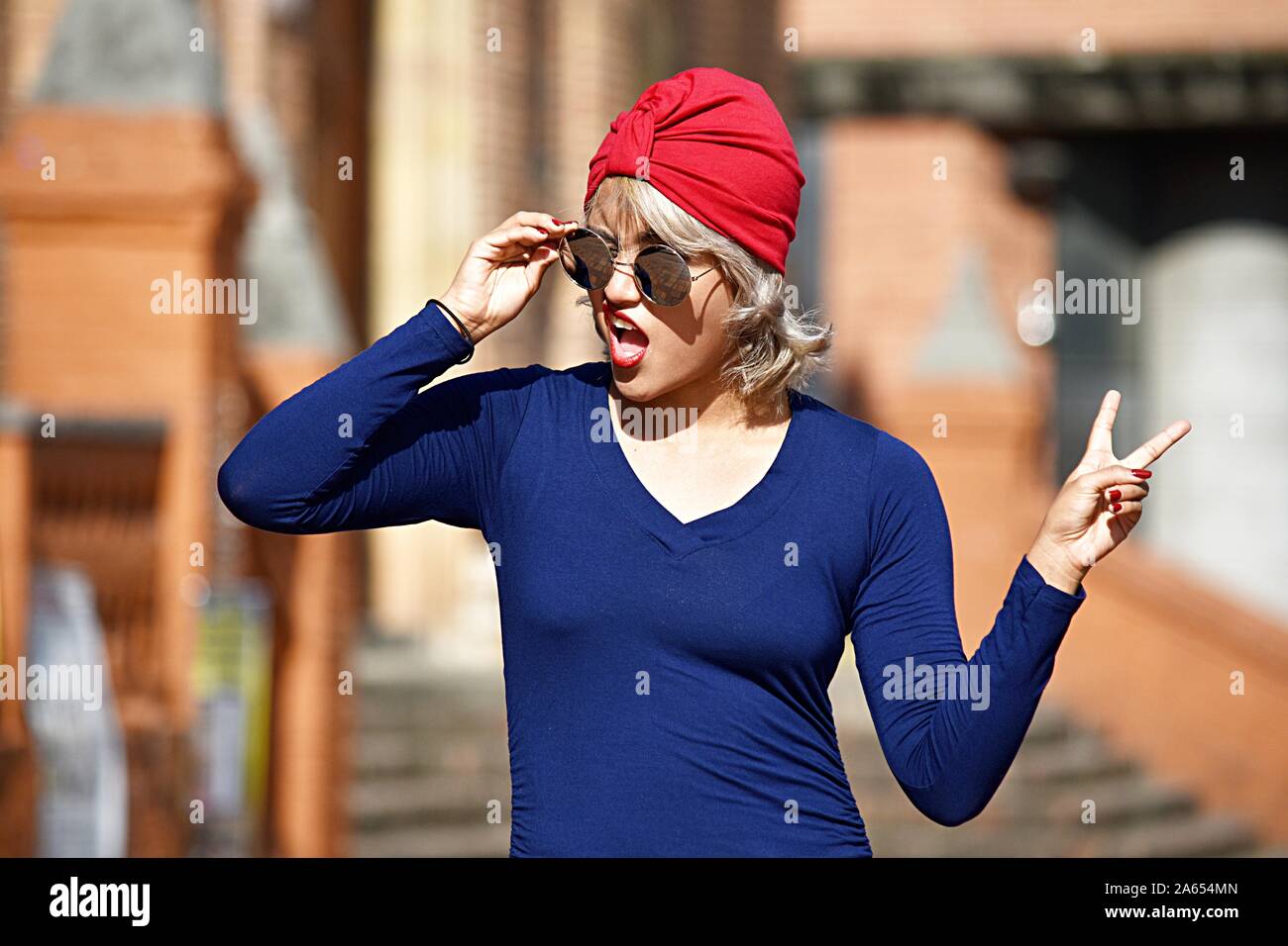 Muslim peace sign hi-res stock photography and images - Alamy