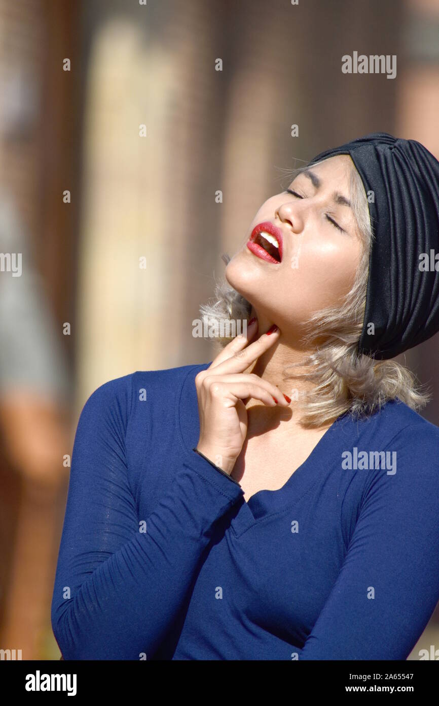 Contemplative Muslim Woman Stock Photo - Alamy