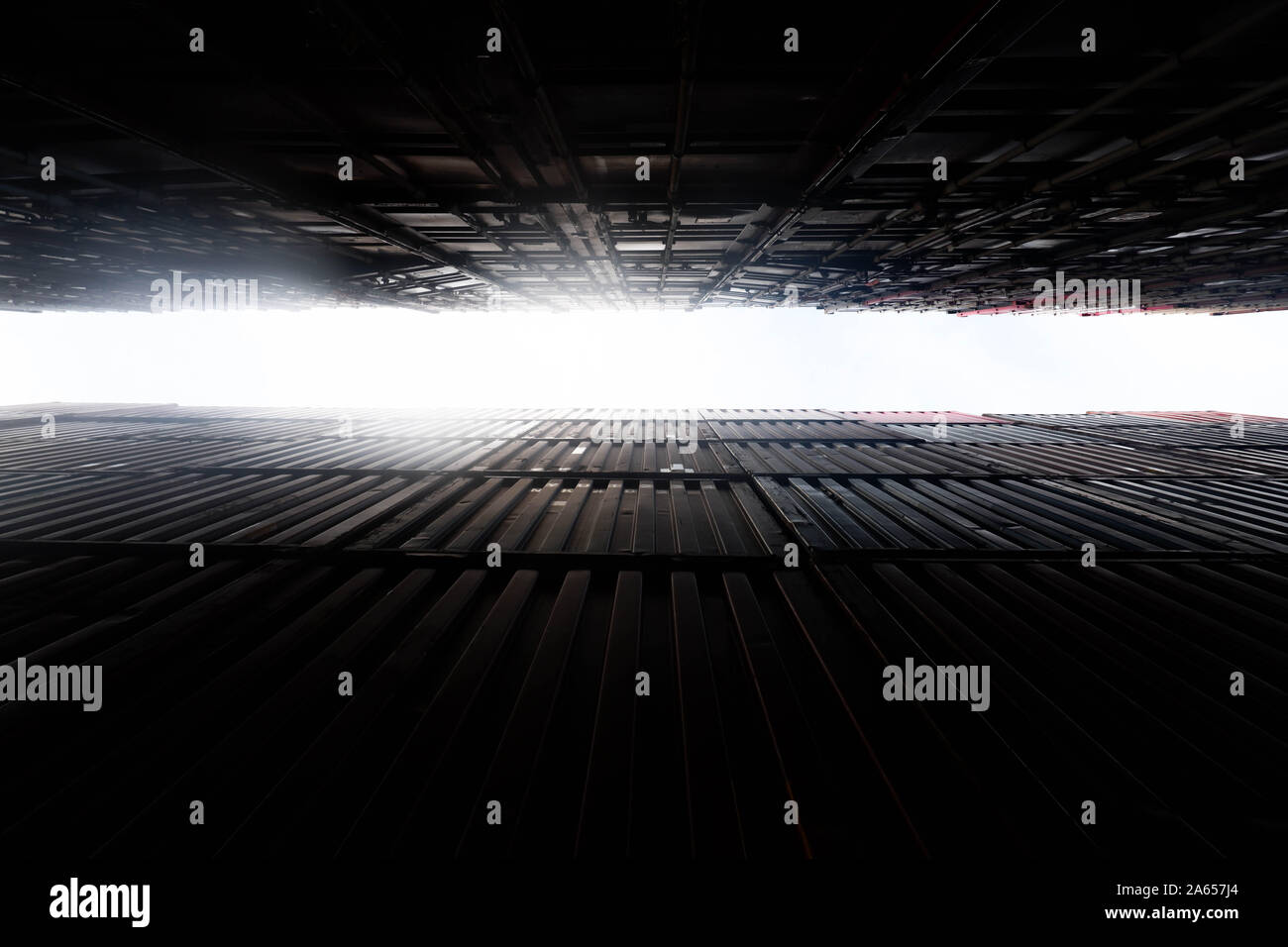 Front view of container stack Shining end Stock Photo - Alamy