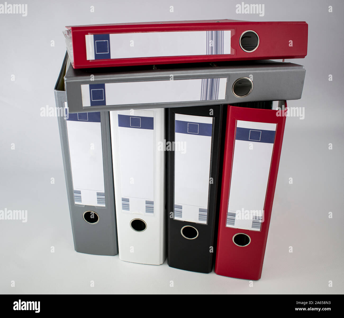 Assorted colored document file cabinets for office Stock Photo - Alamy