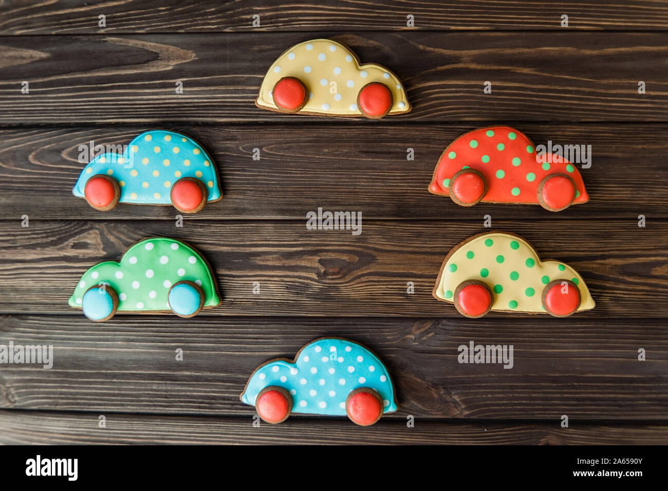 gingerbread cookie in the form of machines on wood background. Car ...