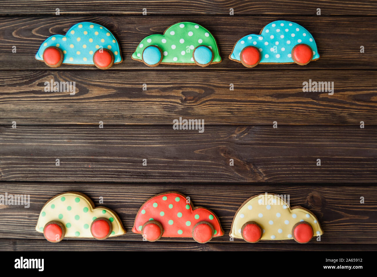 gingerbread cookie in the form of machines on wood background. Car ...