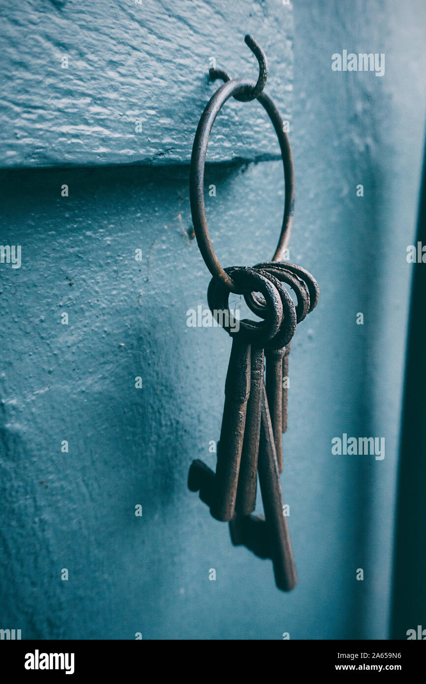 Old keys hanging on a wall hi-res stock photography and images - Alamy