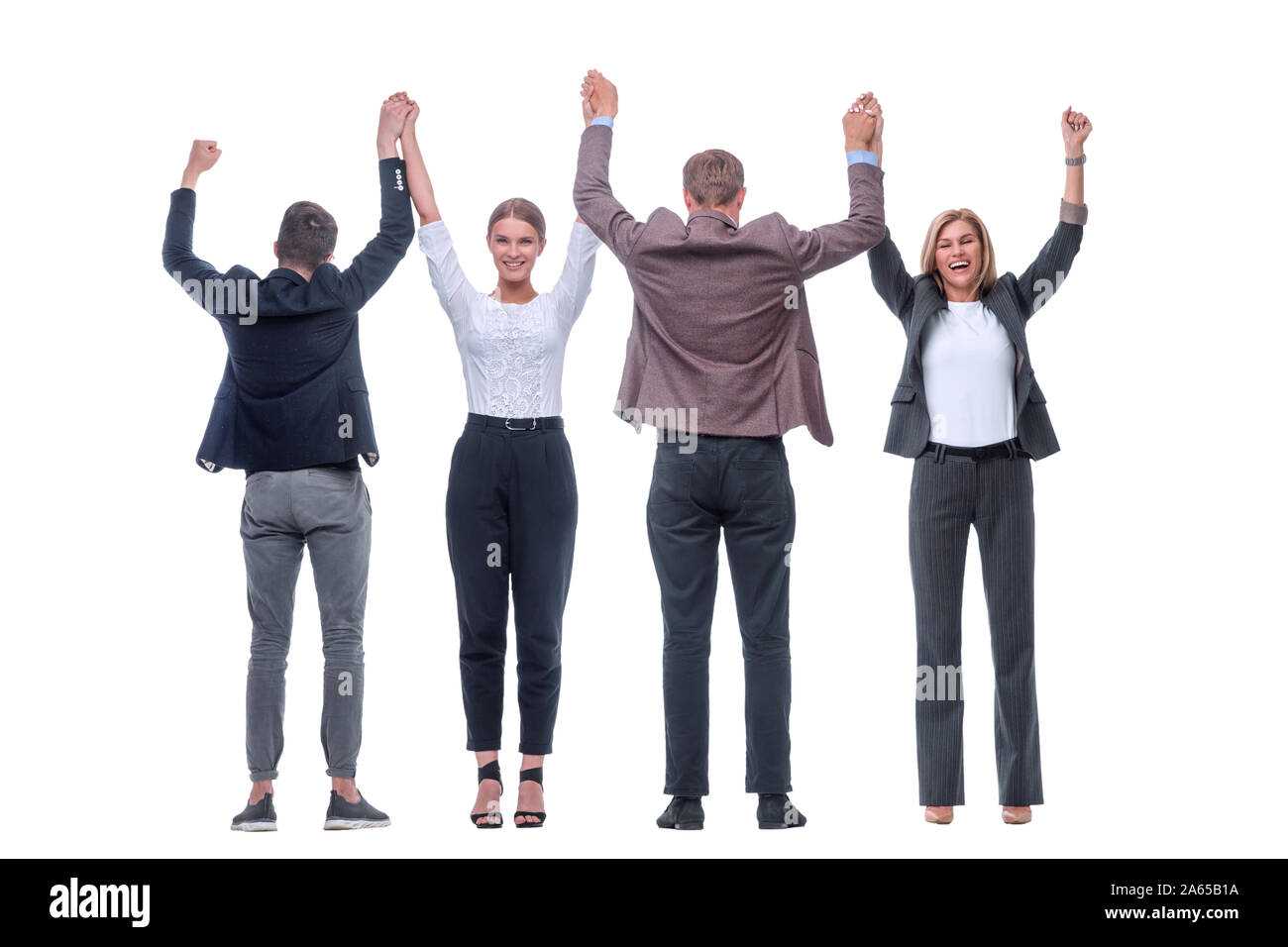 in full growth. successful business team showing their unity Stock ...