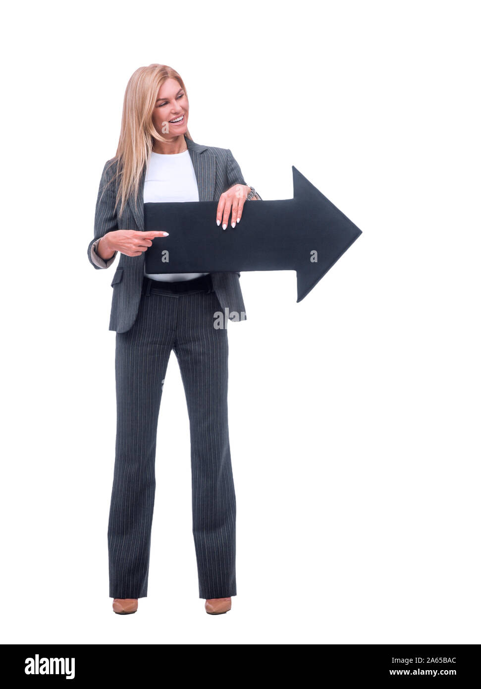 in full growth. young business woman pointing the right direction Stock ...