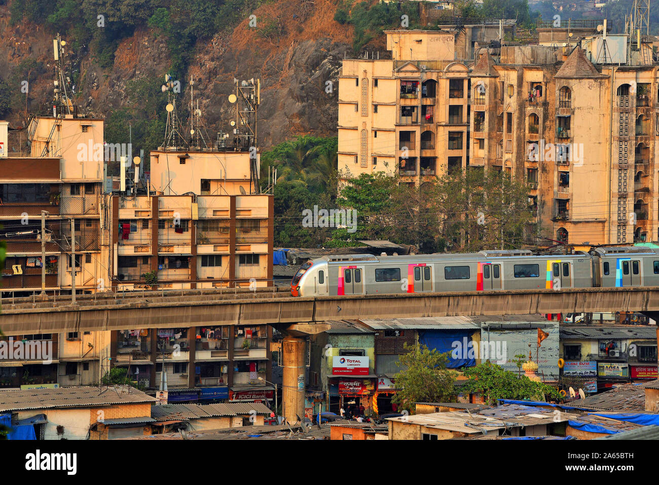 Metro train near Asalpha railway station, Bombay, Mumbai, Maharashtra ...