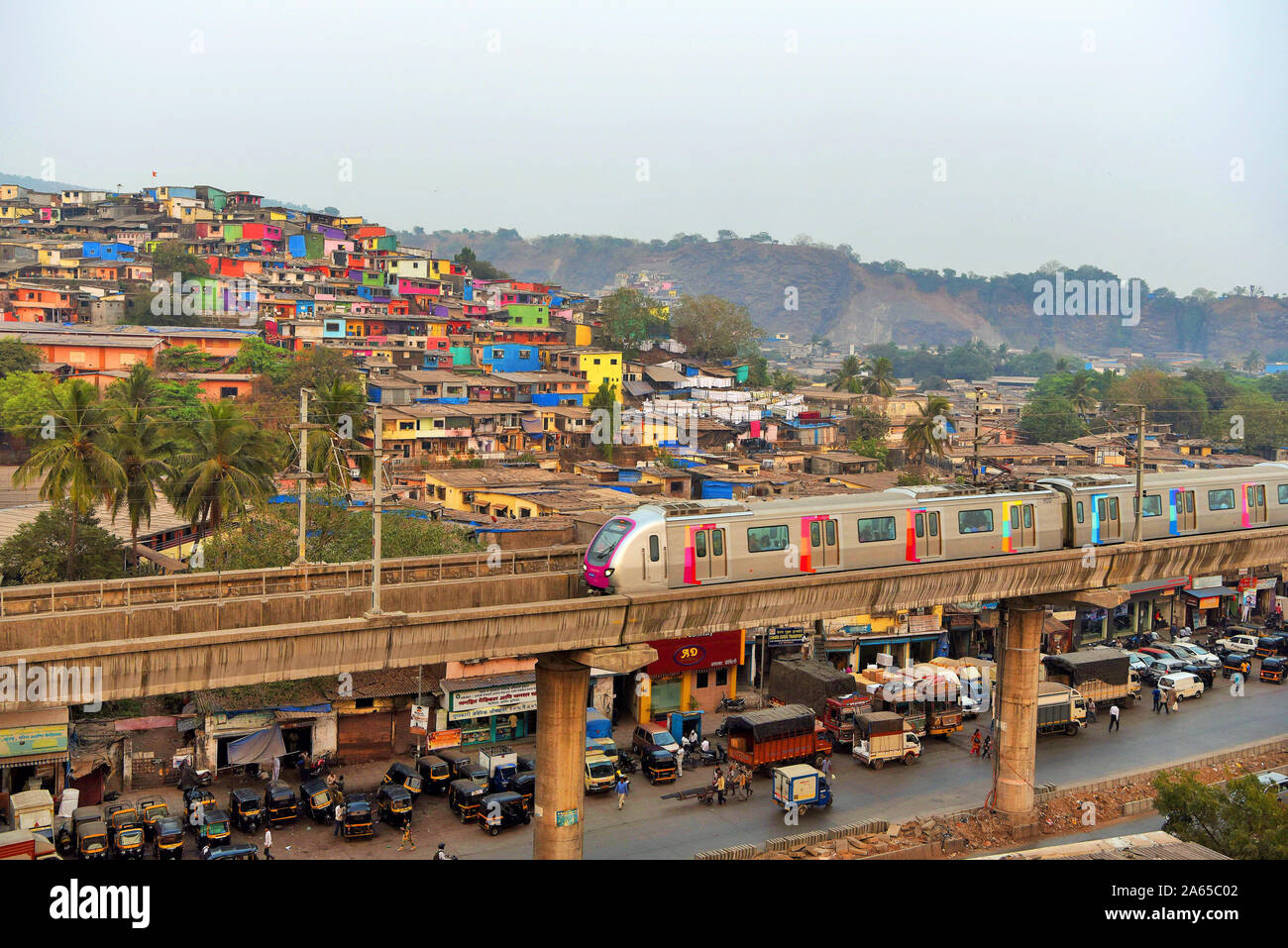 Metro train near Asalpha railway station, Bombay, Mumbai, Maharashtra ...