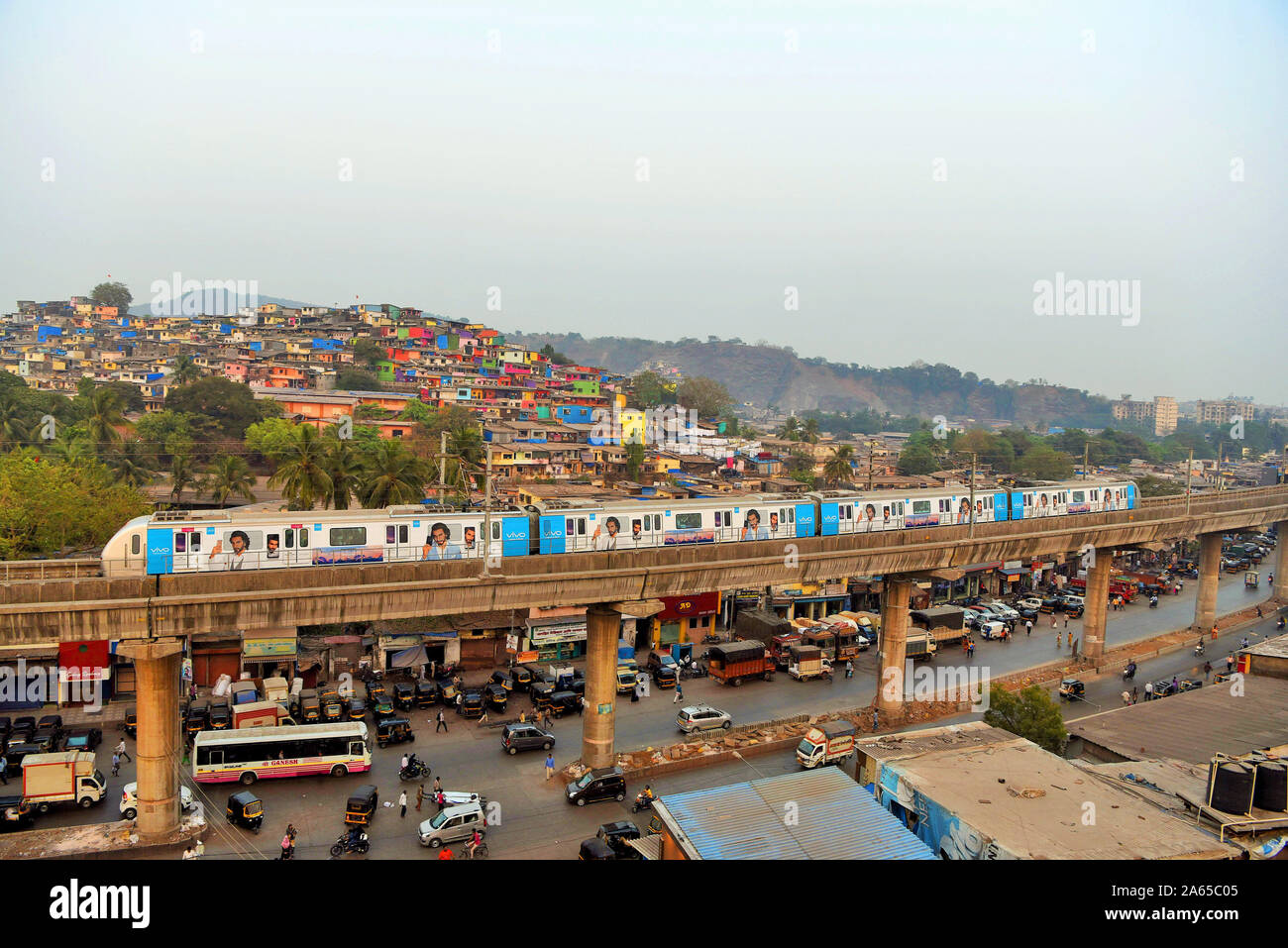Metro train near Asalpha railway station, Bombay, Mumbai, Maharashtra ...