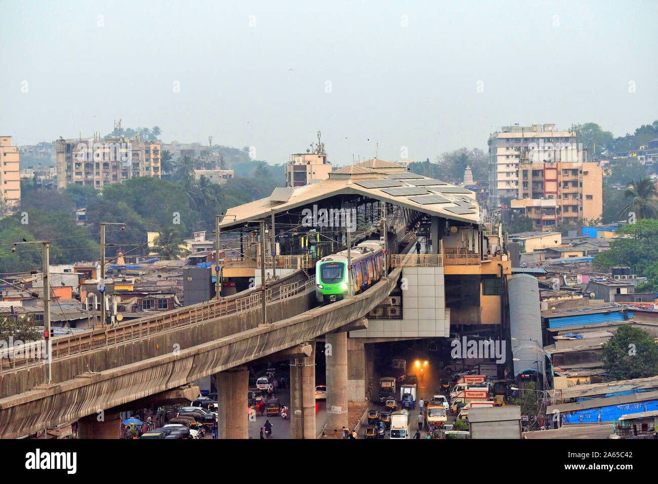 Metro train near Asalpha railway station, Bombay, Mumbai, Maharashtra ...