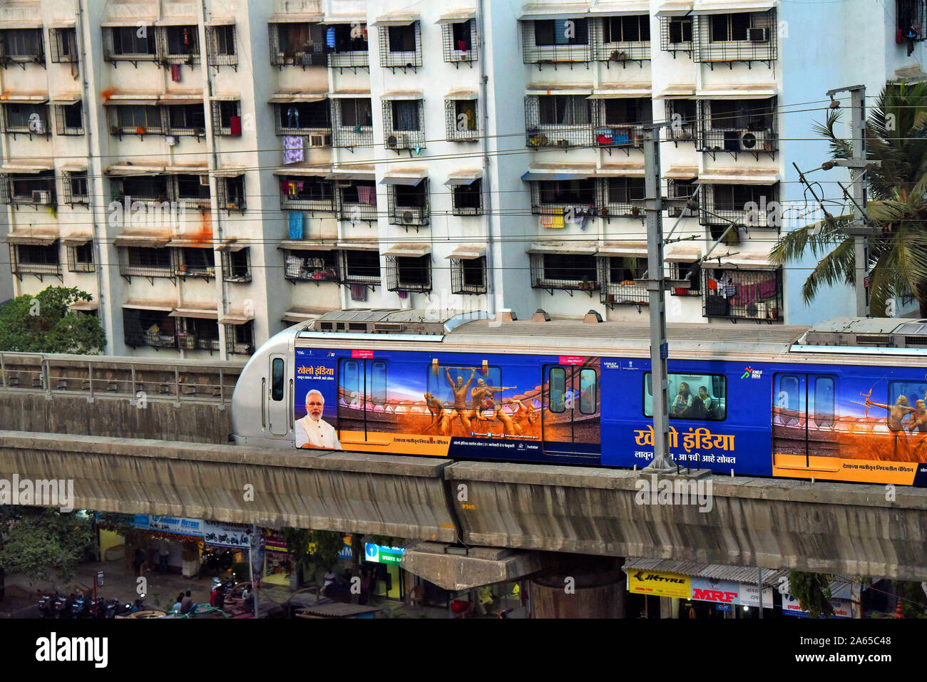 Metro train near Asalpha railway station, Bombay, Mumbai, Maharashtra ...