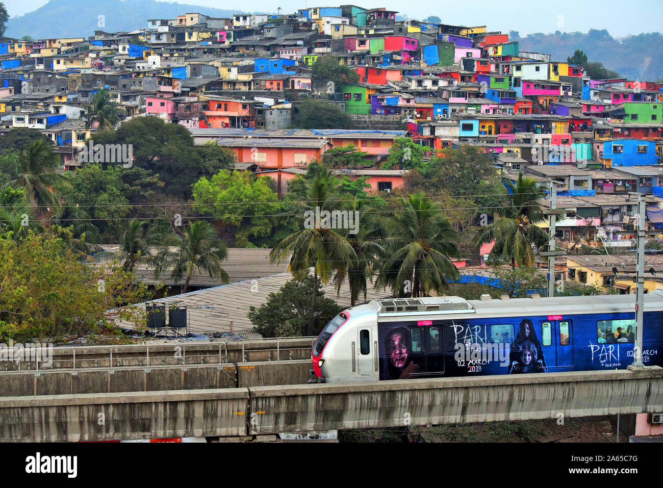 Metro train near Asalpha railway station, Bombay, Mumbai, Maharashtra ...