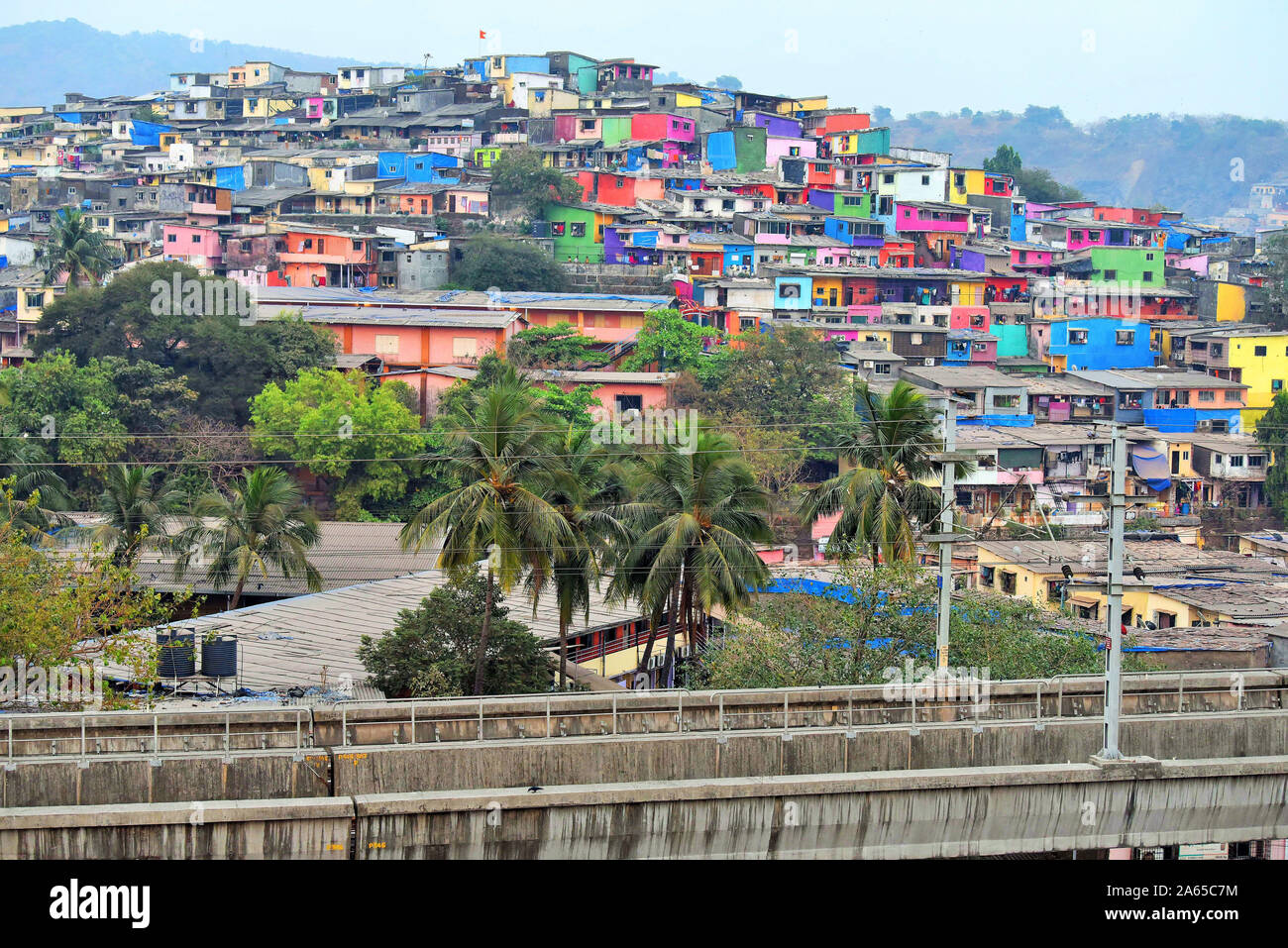 Metro train near Asalpha railway station, Bombay, Mumbai, Maharashtra ...