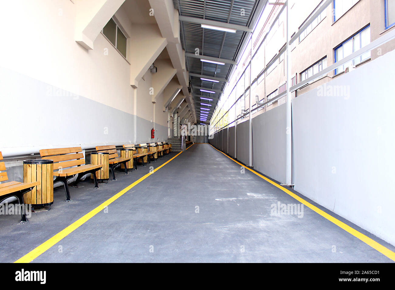 Narrow asphalt parking lot Loading a large manufacturing plant Stock ...