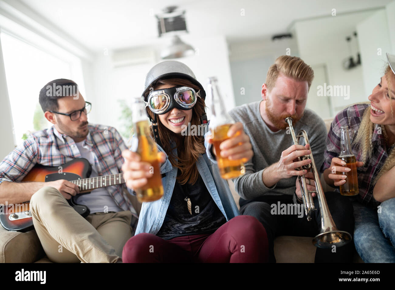 Group of friends having fun together, talking, laughing and enjoying ...