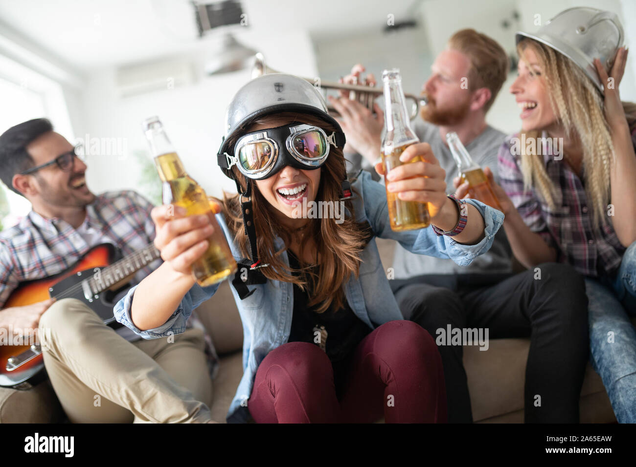Group of happy friends having fun and party Stock Photo - Alamy